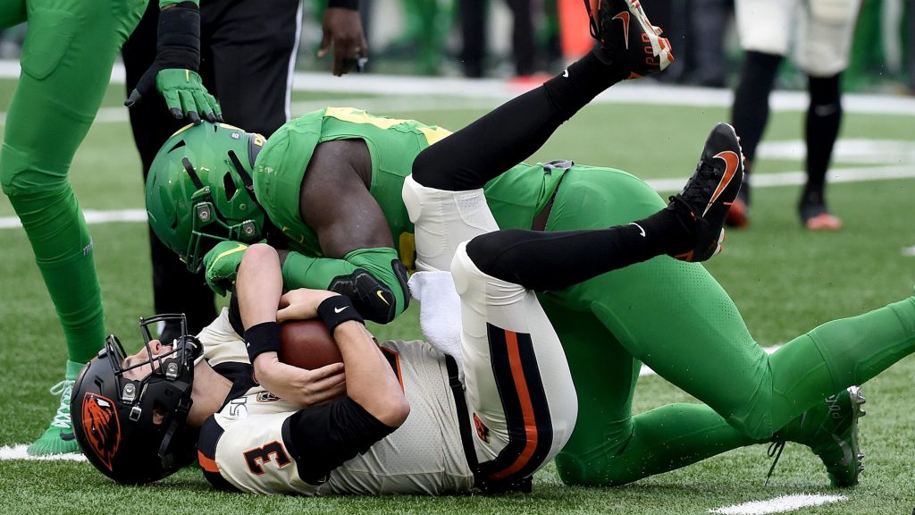 Cardinals sign LB Bryson Young, release LB Reggie Walker